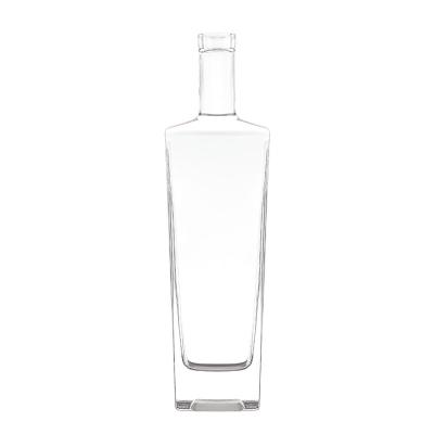 China 500ml 700ml 750ml Cork Whisky White Liquor Water Sauce Fruit Embossed Vodka Bottle for Rum for sale