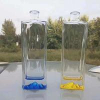 China Custom Design 500ml 750ml Square Glass Vodka Bottle with Cap for sale