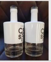 China 750ml Super Flint Glass Beverage Bottle in Matte Black and White with Custom Label for sale