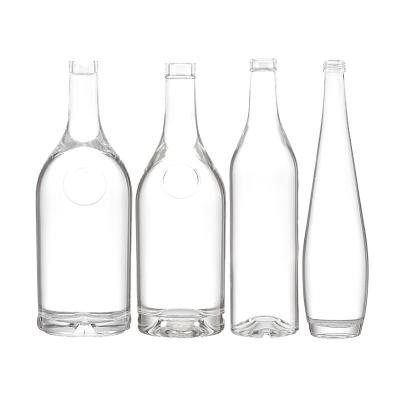 China Industrial Beverage 500ml Clear Round Glass Liquor Bottle with Airtight Cork Lid for sale