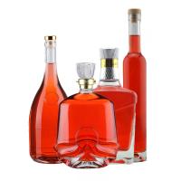 China Freely Sealing Type 500ml 750ml Transparent Empty Whiskey Spirits Glass Bottles for Liquor for sale