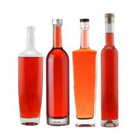 China Freely Sealing Type 500ml 750ml Transparent Empty Whiskey Spirits Glass Bottles for Liquor for sale