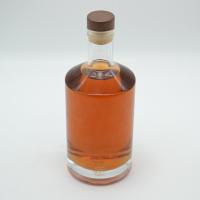 China Fancy Clear Glass Bottle for Whiskey Custom Logo Round Shape 750ml Glass Liquor Bottles for sale