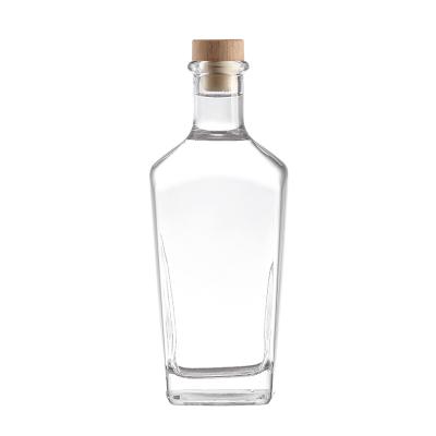 China Screw Cap/Cork Sealing Type 750ml Glass Liquor Bottle with Hot Stamping Surface Handling for sale