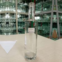 China Super Flint Glass Collar Round 700ml Cork Top Clear Gin Bottle for Vodka Enthusiasts for sale