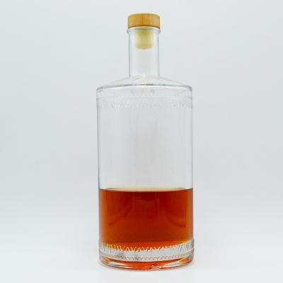 China Whisky 700ml Black Alcohol UV Champagne Bottle Frosted Roller Empty Bottles 500ml 1000ml for sale