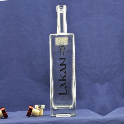China Customized Logo Acceptable Clear White 750ml Spirit Bottle for Rum Vodka and Whiskey for sale