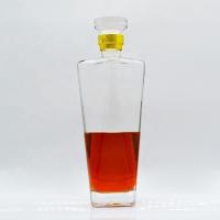 China Custom Empty Liquor Bottle 1L Vodka Glass Bottle with Unique Design Express Shipping for sale