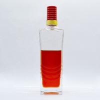 China Custom Empty Liquor Bottle 1L Vodka Glass Bottle with Unique Design Express Shipping for sale