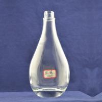 China Deep Process Hot Stamping Glass Bottle for Wine in Water Drop Shape for sale