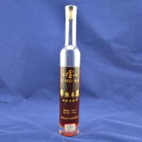 China Customizable Logo Printing Slim Tall Round Glass Vodka Liquor Bottles with Cork Seal for sale