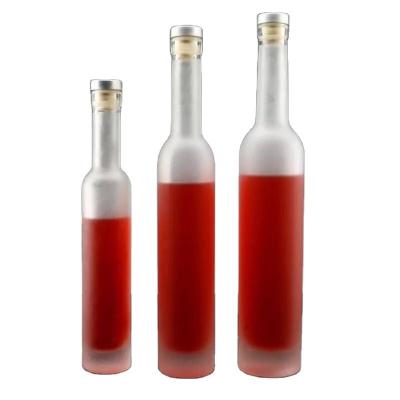 China 1L Fancy Clear Glass Vodka Bottle with Frost Surface Handling and Other Deep Process for sale