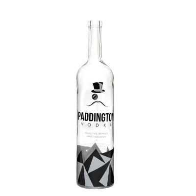 China Empty Transparent 700ml Cork Top Clear Vodka Glass Bottle for Liquor for sale