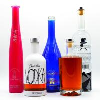 China 750ml Whisky Empty Extra Flint Vodka Round Glass Bottle for Beverage for sale