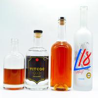 China 750ml Whisky Empty Extra Flint Vodka Round Glass Bottle for Beverage for sale