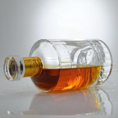 China Glass Bottle Capacity 750ml Mountain Base Round Flint Bottle Square Shoulder Gin Whiskey for sale