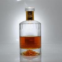 China Glass Bottle Capacity 750ml Mountain Base Round Flint Bottle Square Shoulder Gin Whiskey for sale