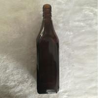 China Hot Stamping 750ml Amber Glass Bottle for Vodka Whisky Brandy Beverage for sale