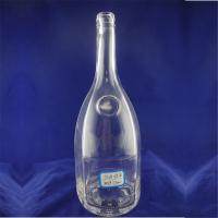 China Free Sample 500 ml 750 ml Glass Round Liquor Bottle with Cork Sealing Type for sale