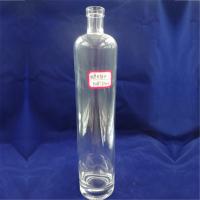 China Free Sample 500 ml 750 ml Glass Round Liquor Bottle with Cork Sealing Type for sale