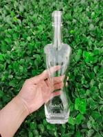 China Decal Surface Handling Vodka Glass Bottle for Women's Body Shape in Crystal White Material for sale