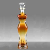 China Decal Surface Handling Vodka Glass Bottle for Women's Body Shape in Crystal White Material for sale