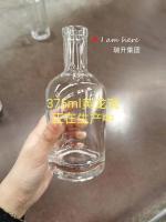 China Decal 700ml 1000ml Screen Printing Screw Lid Clear and Frosted Flat Flask Coffee Glass Bottle for Liquor for sale