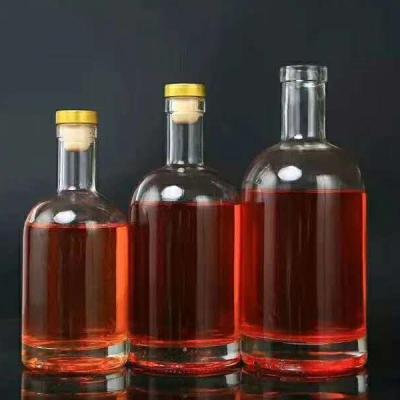 China Transparent 750ml Glass Vodka Bottle for Liquor Clear White Customized Logo Acceptable for sale
