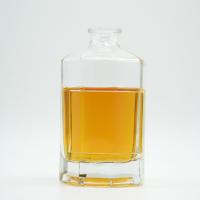 China Custom Design 750ml Glass Liquor Bottle with Unique Shape and Guala Sealing Type for sale
