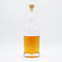 China Custom Design 750ml Glass Liquor Bottle with Unique Shape and Guala Sealing Type for sale