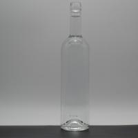 China Super Flint Glass Whiskey Rum Gin Bottles with Custom Relief Carving Design and Wooden Stopper for sale