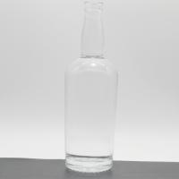 China Super Flint Glass Whiskey Rum Gin Bottles with Custom Relief Carving Design and Wooden Stopper for sale