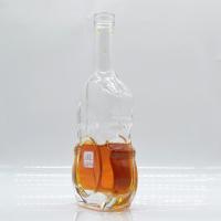 China Big Good 700ml 750g Transparent Glass Packaging for Special Shape Violin Skull Bottle for sale