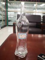 China Electroplating Custom Design Engraved Glass Bottle for Vodka/Brandy/Whiskey 500ml 700ml for sale