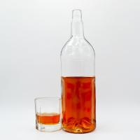 China 750ml Custom Glass Bottle for Spirits Transparent Irregular Shaped Tequila Bottle for sale