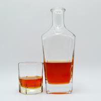 China 750ml Custom Glass Bottle for Spirits Transparent Irregular Shaped Tequila Bottle for sale