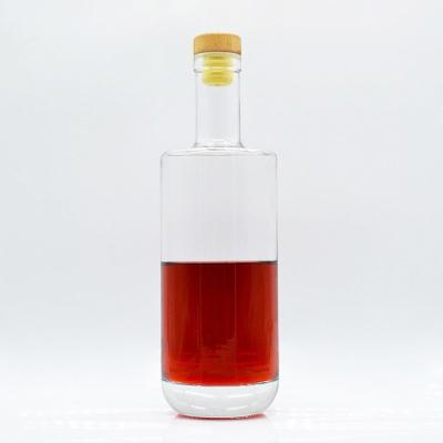 China Industrial Beverage 700ml Clear Glass Bottle with Cork and Super Flint Glass Material for sale