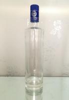 China Super Flint Glass Vodka Spirit Glass Bottle with Guala Cap and Embossed Logo Product for sale