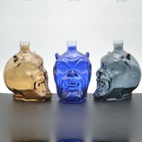 China SCREW CAP Sealing Type Super Flint Glass Skull Whiskey Bottle Base Material for sale