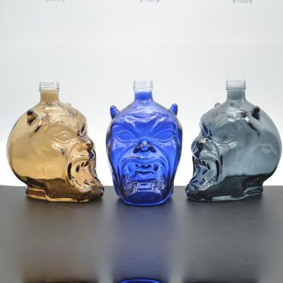 China SCREW CAP Sealing Type Super Flint Glass Skull Whiskey Bottle Base Material for sale