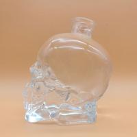 China SCREW CAP Sealing Type Super Flint Glass Skull Whiskey Bottle Base Material for sale