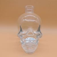 China SCREW CAP Sealing Type Super Flint Glass Skull Whiskey Bottle Base Material for sale