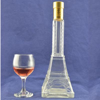 China Embossed High Flint Glass Material Eiffel Tower Shape Glass Liquor Bottle with Cork for sale