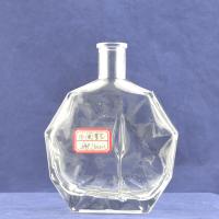 China Embossed High Flint Glass Material Eiffel Tower Shape Glass Liquor Bottle with Cork for sale