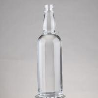 China Embossed Clear Round Tall Guala Cap Whiskey Bottle Glass Bottles with Corks for sale