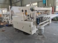 China 1400mm Width PLC Touch Screen Toilet Paper Converting Machine for sale