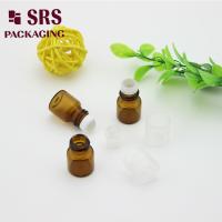 China SRS empty 1ml amber glass roll on perfume bottle with clear plastic cap for sale