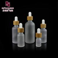 China Custom Frosted Essential Oil Empty Packaging 15ml 30ml 50ml 100ml Bamboo Dropper Bottle for sale