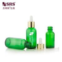 China BOS005-30ml UV-Protected Green Glass Dropper Bottles With Gold Tamper Cap For Premium Skincare Serums 20-400 Thread for sale