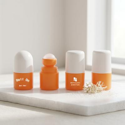 China 30ml Capsule Shaped PP Roll on Bottles Matte Orange Empty Roller Vial for Deodorant Mosquito Repellent Packaging for sale